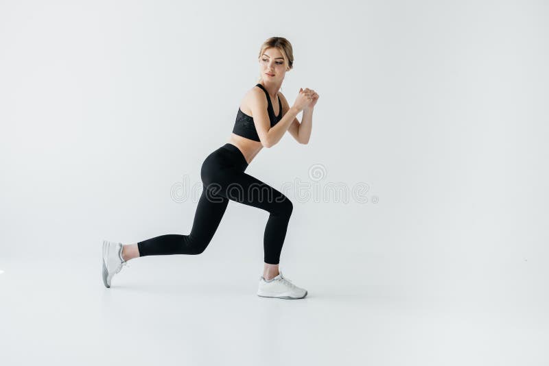 Side View of Young Athletic Sportswoman Doing Lunges Stock Image ...