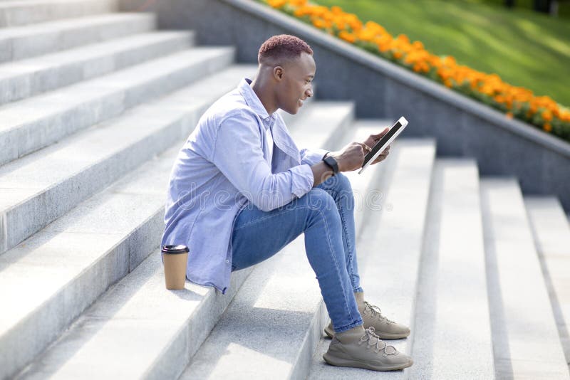Side View Young Black Man Takeout Coffee Using Tablet Computer Stairs ...