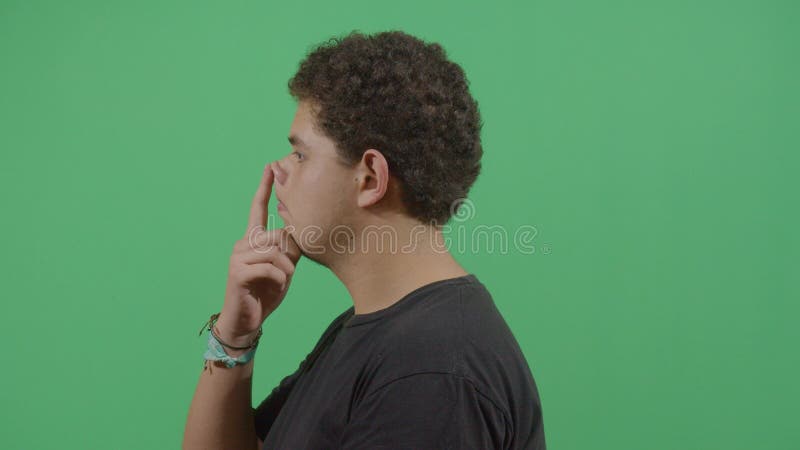 Side View of a Young Boy Pushing on the Nose Stock Footage - Video of ...