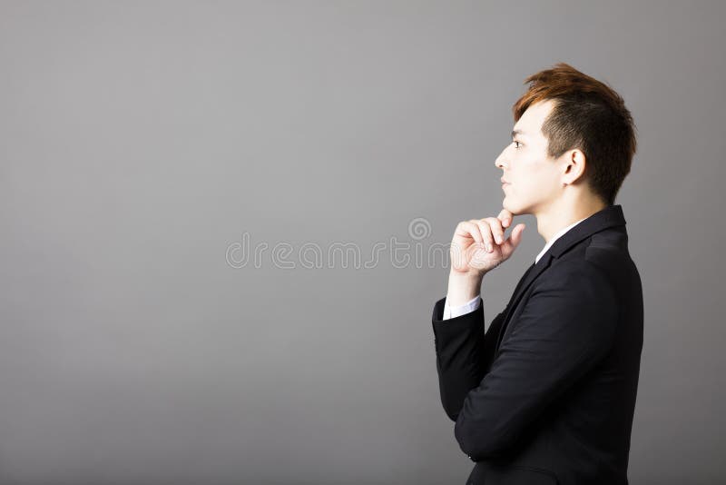 Side View of Young Businessman Thinking Stock Image - Image of serious ...