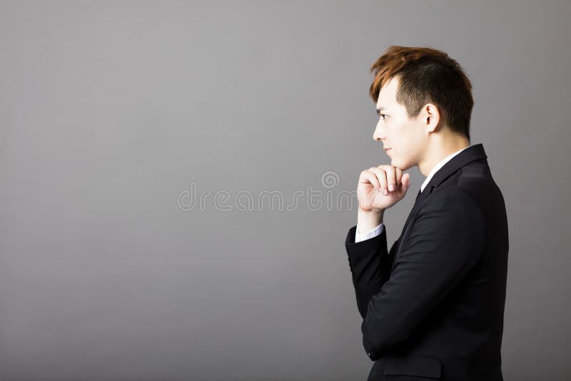 Side View of Young Businessman Thinking Stock Photo - Image of male ...