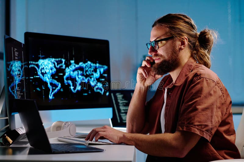 Side View of Young Busy Male it Engineer Giving Consultation on the ...