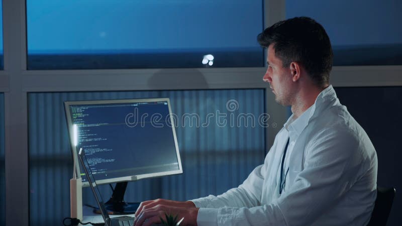 Side View of Young Electronics Engineer Being Engaged in His Research ...