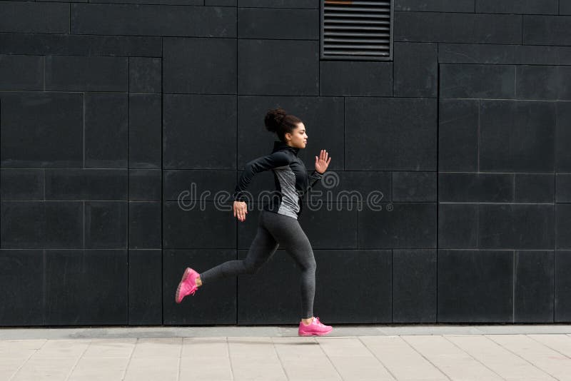 Side View of Young Female Runner Stock Image - Image of woman, person ...
