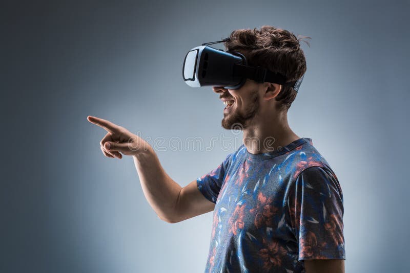 Side View Of A Young Guy Using A VR Headset. Emotions Stock Image ...