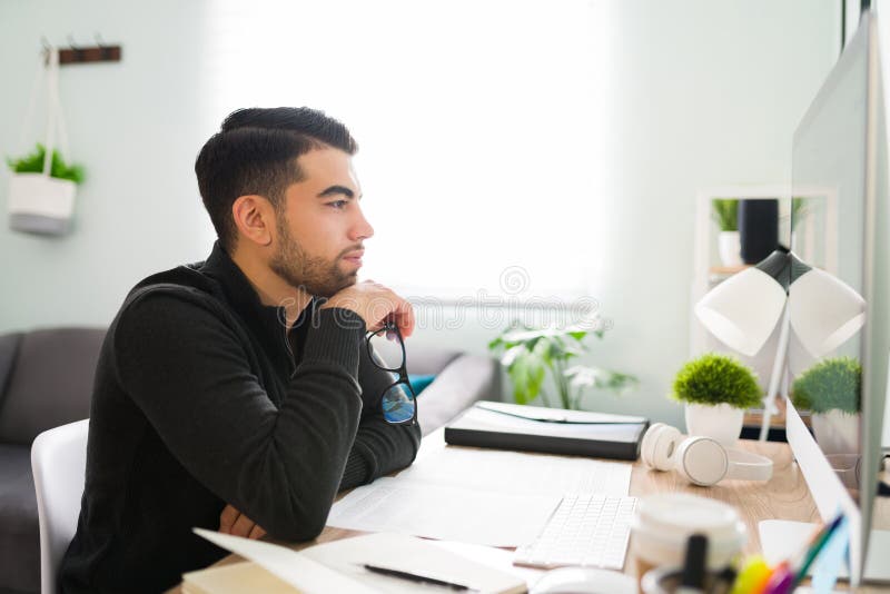 Side View of a Young Guy Working As a Writer and Editor Stock Photo ...