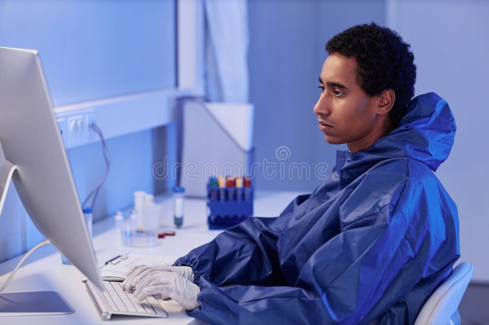 Side View Young Male Scientist Using Computer in Laboratory Stock Photo ...