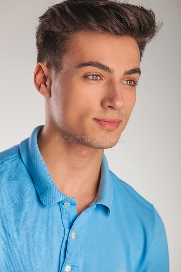 Side View of a Young Man in Blue Polo Shirt Stock Image - Image of ...