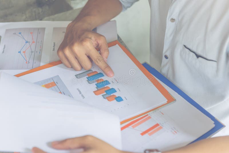 Side View of Young Man Checking Financial Data on Document Stock Photo ...