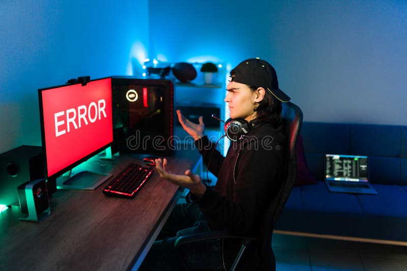 Side View of a Young Man Worried about a Glitch in a Videogame Stock ...