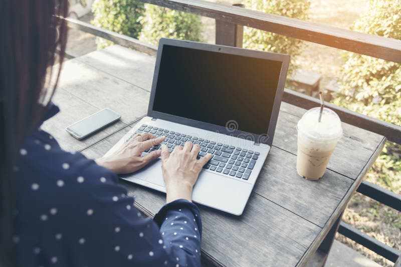 Side View of Young Smart Female Using Laptop with Sunlight. Working ...