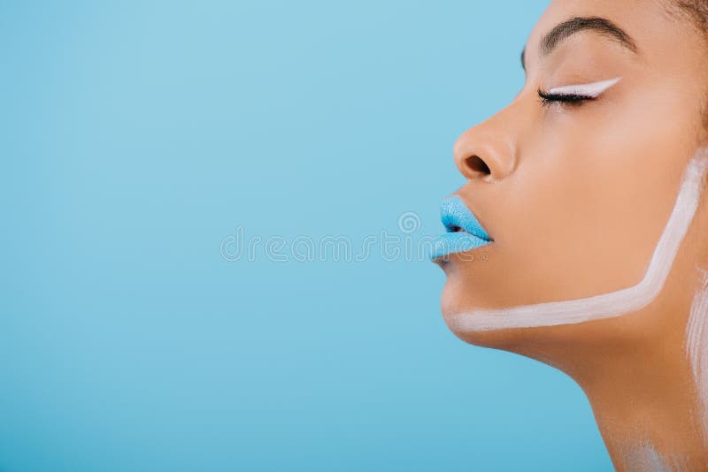 Side View of Young Woman with Creative Makeup and Blue Lips Stock Photo ...