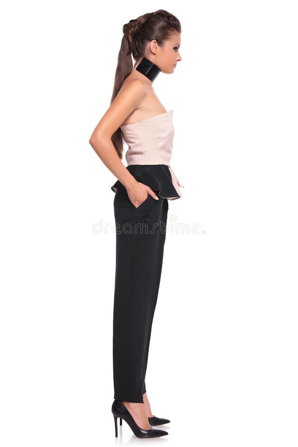 Side View Of A Young Woman With Hands In Her Pockets Stock Image ...