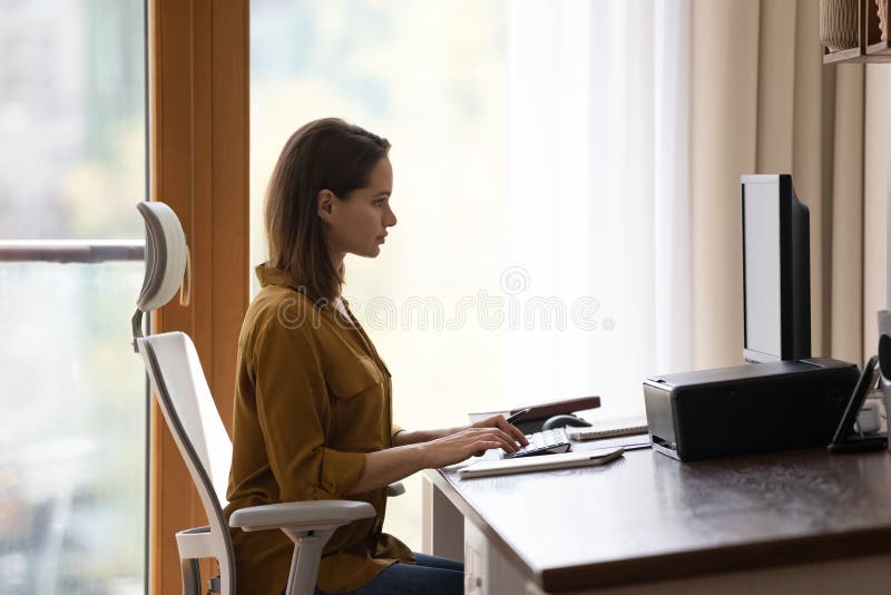 Side View Young Woman Sit at Desk Working on Pc Stock Photo - Image of ...