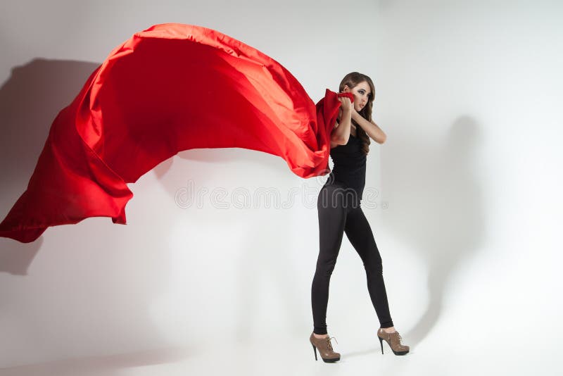 Side View of Young Woman with Waving Red Cloth Stock Photo - Image of ...