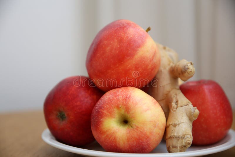 Side View Group of Delicious Red Apples with Ginger Roots Stock Photo ...