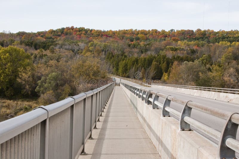 Side walk by the bridge stock image. Image of gold, leaf - 11394773