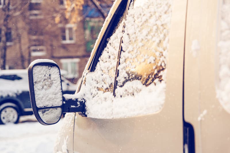The Side Window and Mirror of a Big Car Covered Snow. Stock Photo ...
