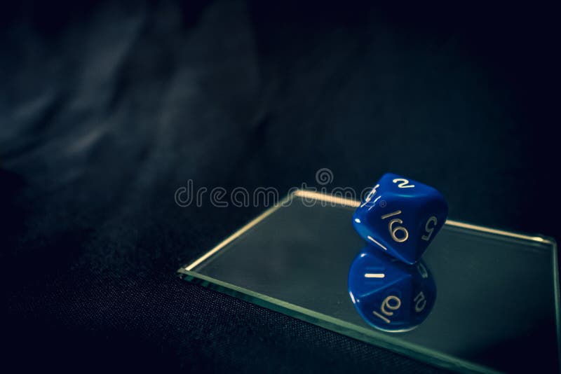 10 Sided Blue Die for a Game on a Mirror Stock Image - Image of mirror ...