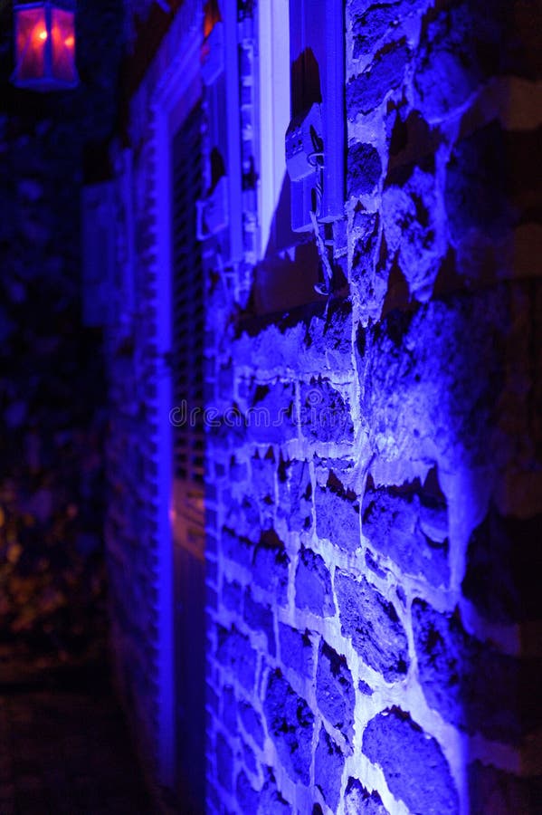 Sideview of an Old-fashioned Brick & Mortar Building Wall at Night ...