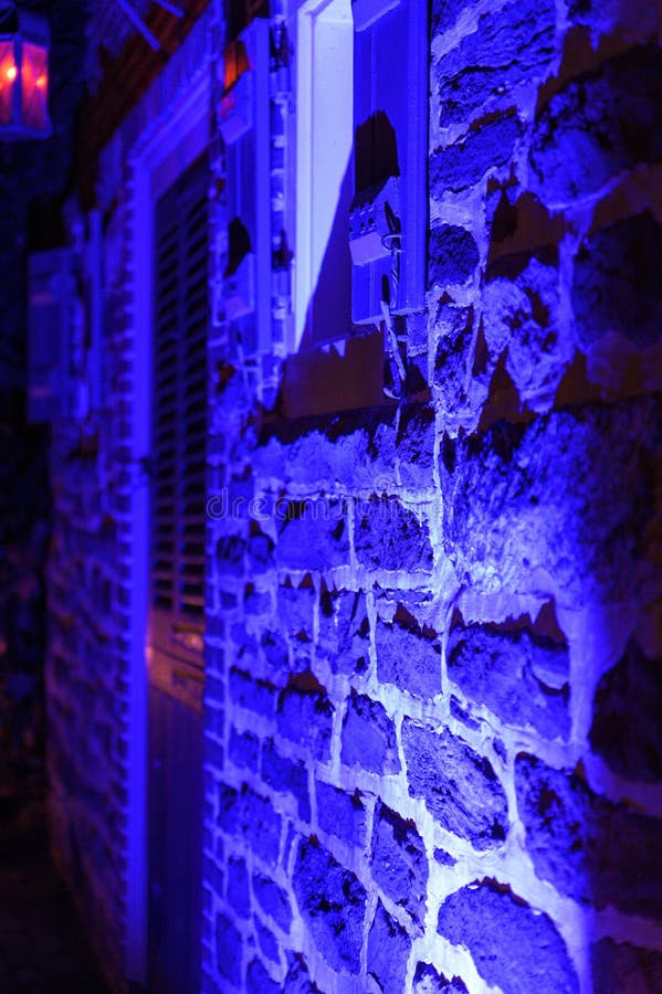 Sideview of an Old-fashioned Brick & Mortar Building Wall at Night ...