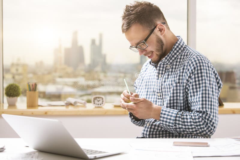 Sideview of Young Businessman Taking Notes Stock Photo - Image of ...