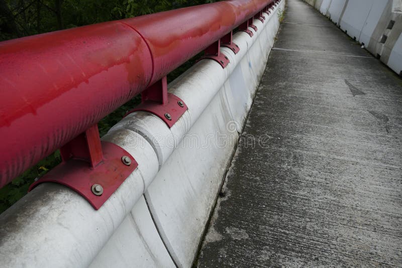 Sidewalk on a Bridge with Red Railing Stock Image - Image of travel ...