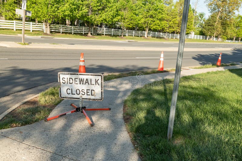 SIDEWALK CLOSED on Orange Cone. Warning on Sidewalk in Front of ...