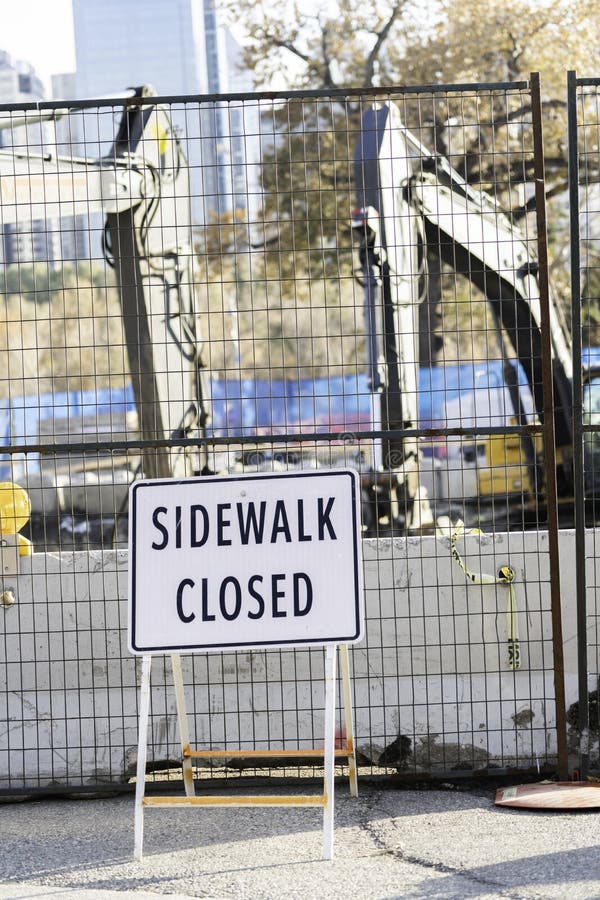 Sidewalk Closed Sign at Construction Site Fence Stock Photo - Image of ...