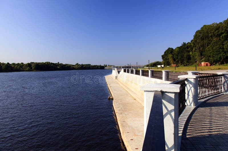 Sidewalk near the river stock image. Image of building - 69642267