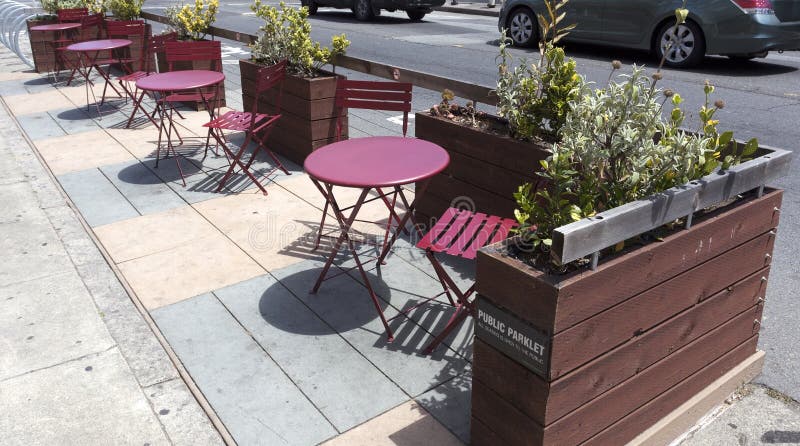 Parklet stock photo. Image of street, parking, table - 117012276