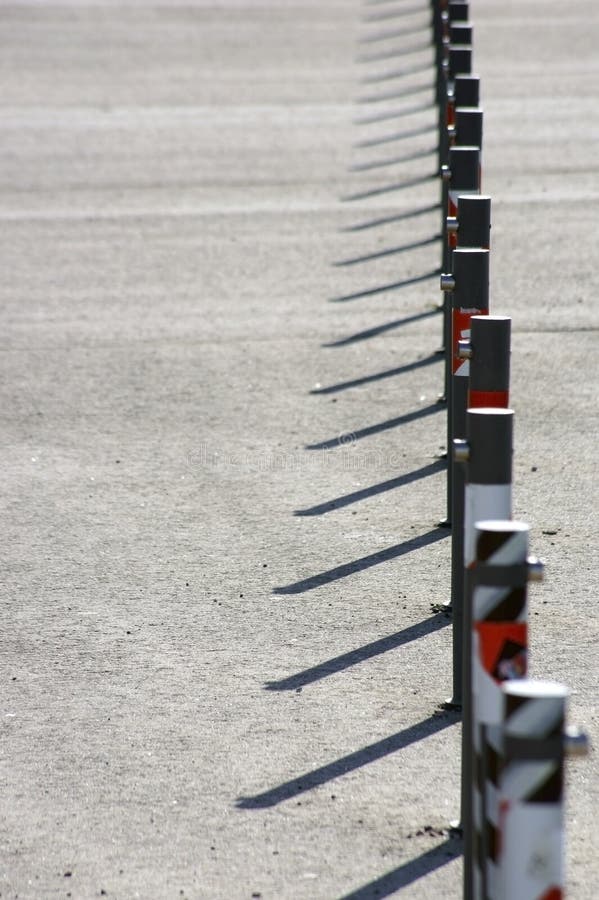 Sidewalk post with shadow stock photo. Image of fencing - 41188144