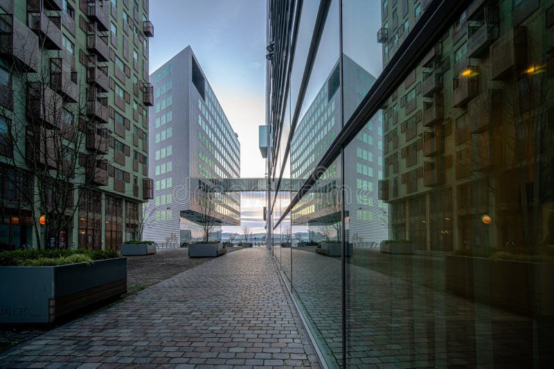 Sidewalk Surrounded by Modern Buildings with Glass Walls and Windows in ...