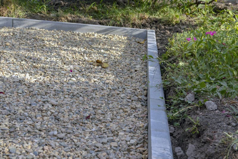 The Sidewalk is Under Construction. Concrete Curb and Crushed Stone ...