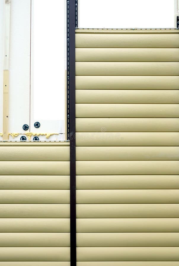 Siding Panels Mounting Over Insulation on Building Wall Closeup Stock ...