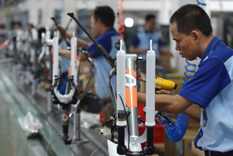 Workers Check on the Assembly Line at the Assembly Bicycle Bike ...