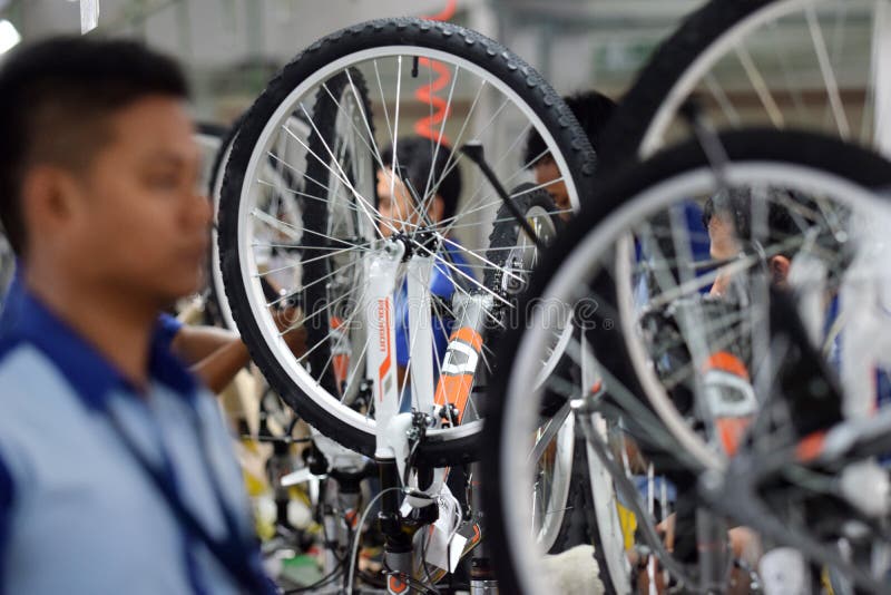 Workers Check on the Assembly Line at the Assembly Bicycle Bike ...