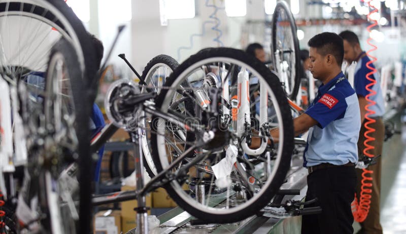 Workers Check on the Assembly Line at the Assembly Bicycle Bike ...