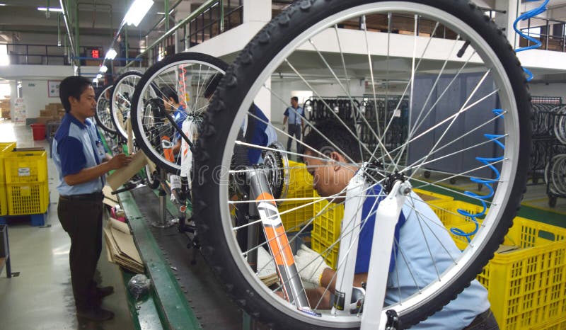 Workers Check on the Assembly Line at the Assembly Bicycle Bike ...