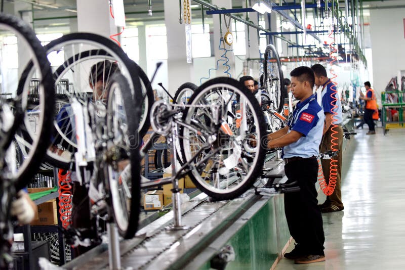 Workers Check on the Assembly Line at the Assembly Bicycle Bike ...
