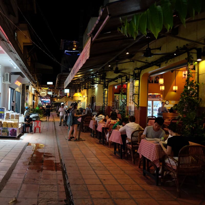 People Eat Dinner at a Cafe Outside, Night Time Editorial Stock Photo ... People Eat Dinner at a Cafe Outside, Night Time Editorial Stock Photo ...