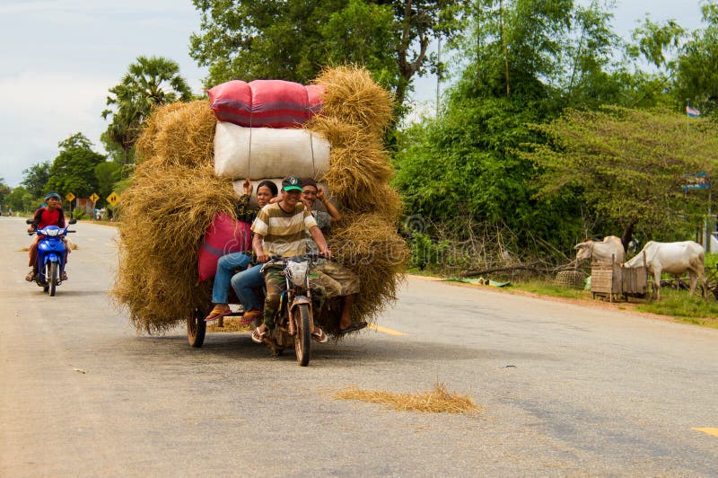 Motorcycle Towing Huge Load of Hay Editorial Stock Image - Image of ...