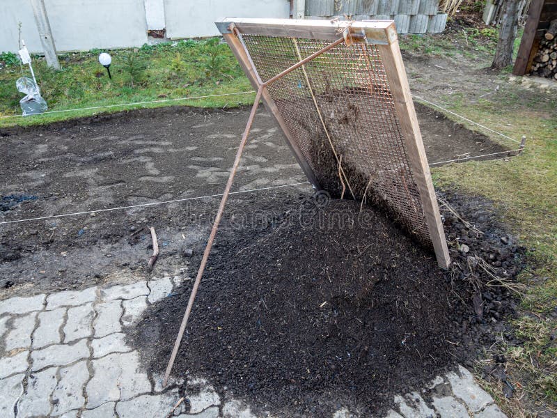 Sieve the Garden Soil with a Sieve Stock Photo - Image of earth, drum ...