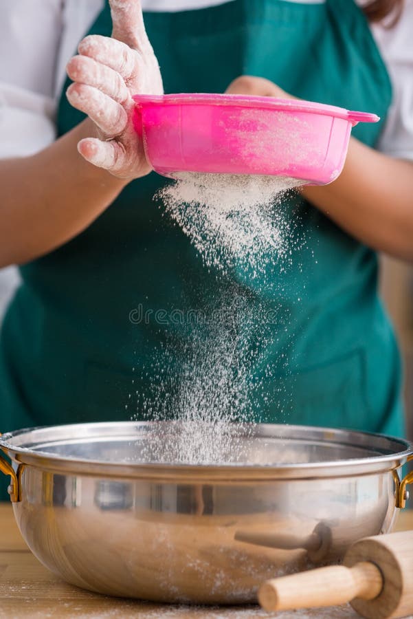 Sifting flour stock photo. Image of culinary, motion - 50319584
