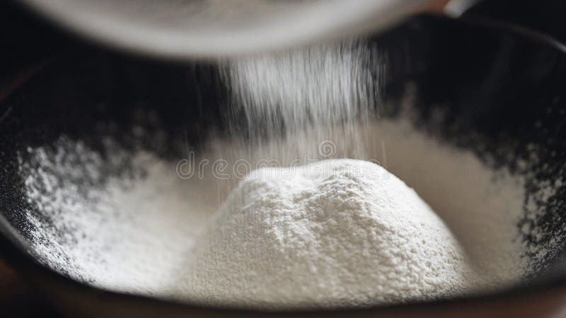 Sifting flour stock image. Image of closeup, sieve, motion - 364863201