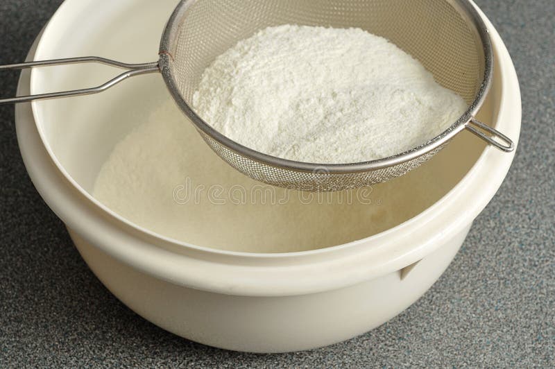 Sifting flour stock image. Image of food, metal, ingredient - 79350907