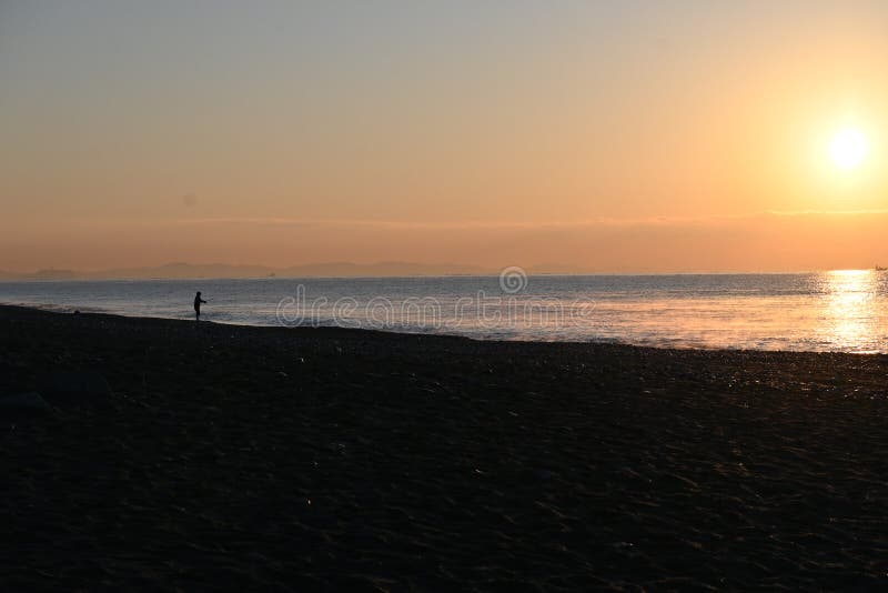 The Sight of Fishing. Surf Casting on the Beach. Stock Photo - Image of ...