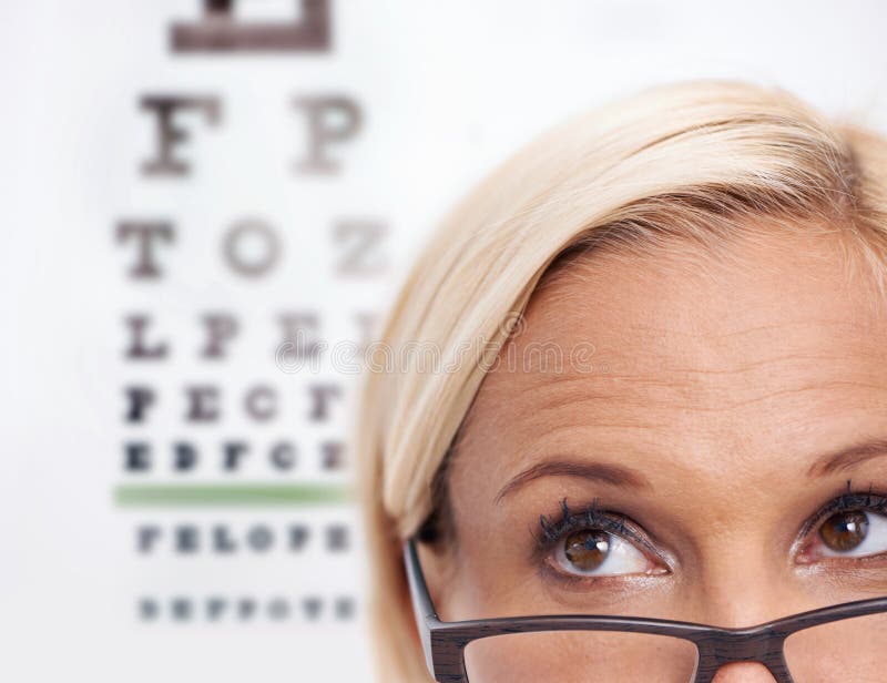 Sight for Sore Eyes. a Cropped Shot of a Beautiful Optometrist in Front ...