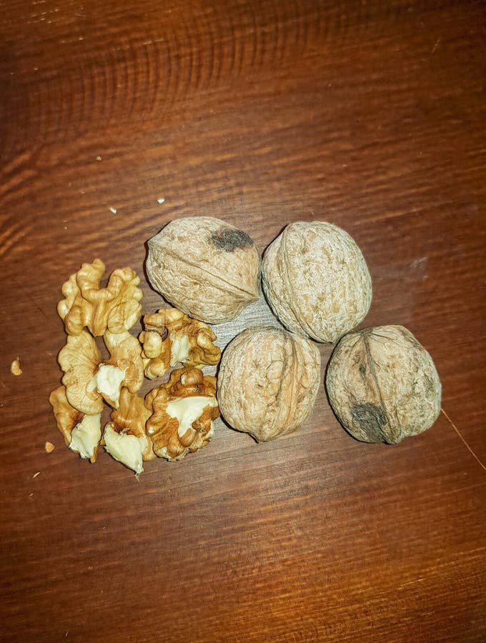 Sight of Walnuts in Their Shells and without Them Stock Image - Image ...