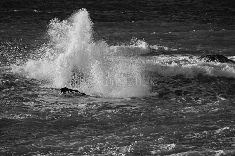 The Sight of Waves Crashing Against the Rocks. Stock Photo - Image of ...